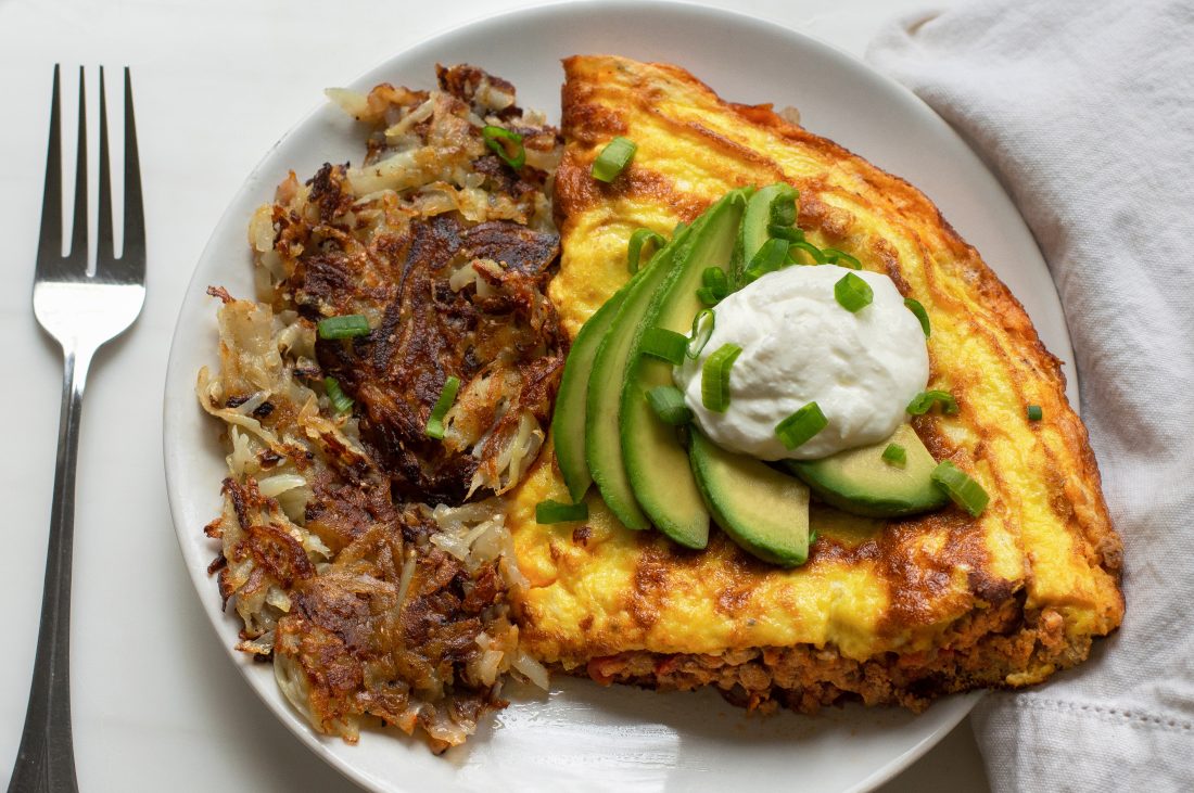 Taco Omelet with Crispy Grated Hashbrows - Aurora Satler